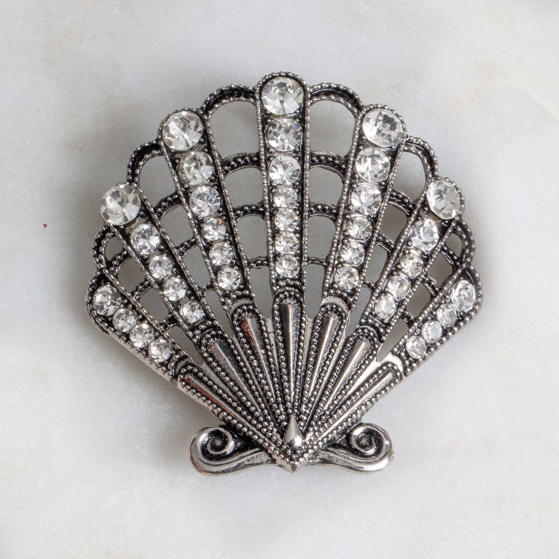 silver brooches